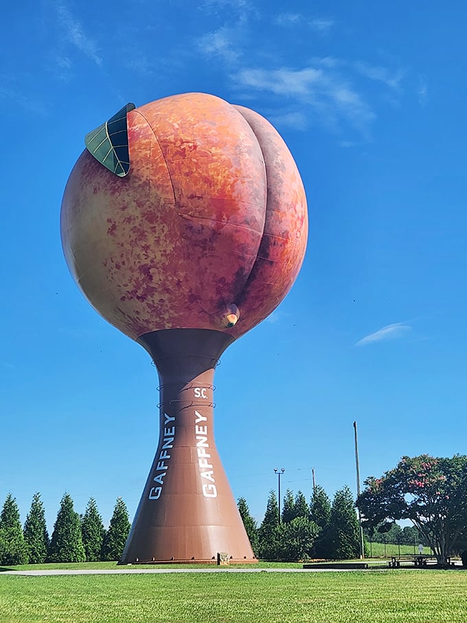 The Peachoid stands proudly against a Carolina blue sky, looking suspiciously like nature's most cheeky fruit. Highway travelers do double-takes daily.