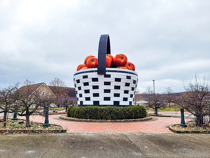 The ultimate picnic accessory for giants! Ohio's World's Largest Apple Basket stands proudly against the cloudy sky, a monument to whimsical thinking.