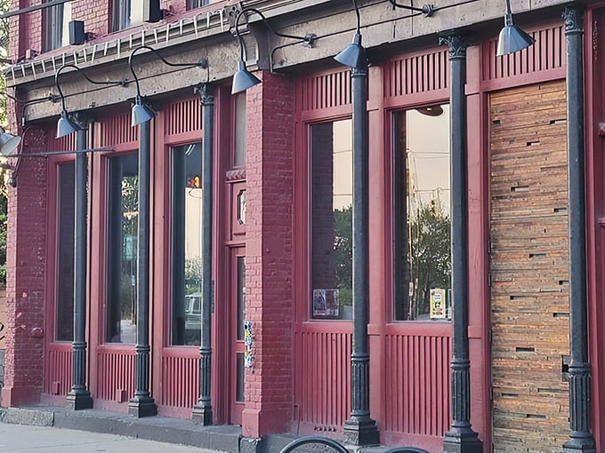 The crimson facade of Slows isn't just a building—it's a beacon for barbecue pilgrims seeking smoky salvation in Detroit's Corktown neighborhood.