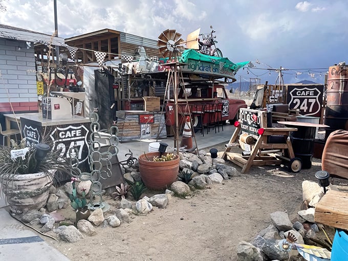 Out front feels like Mad Max meets Route 66&mdash;quirky desert charm promising cold drinks and smoky barbecue dreams.