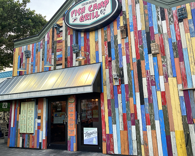 The rainbow explosion of reclaimed wood siding isn't just eye-catching&mdash;it's practically shouting "good times ahead!" at everyone driving by.