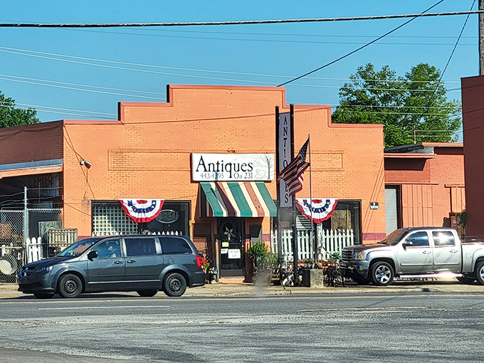 The brick-red facade with its candy-striped awning isn't just inviting&mdash;it's practically shouting "Come in and find your next conversation piece!"