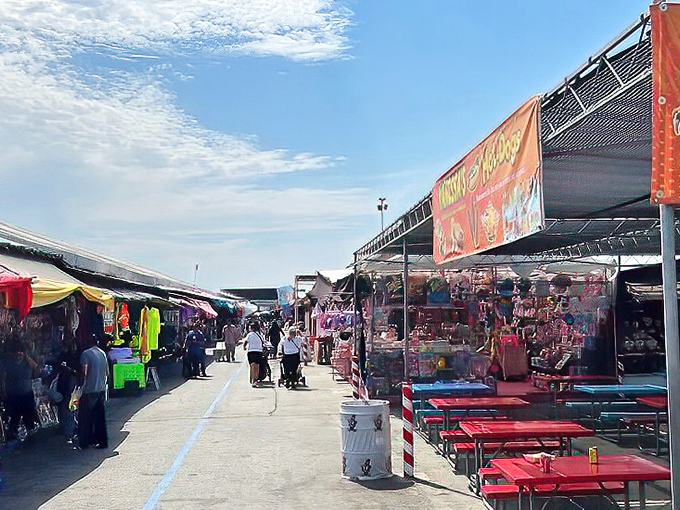 That cheerful "Welcome to The Flea Market" sign promises adventures your credit card will actually appreciate.
