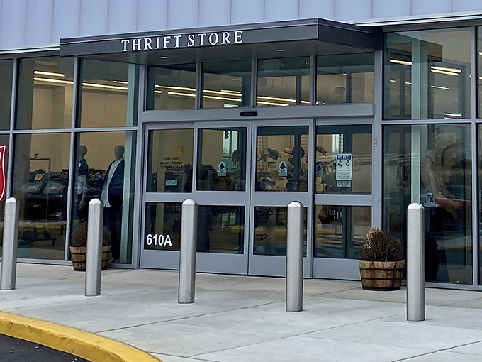 The sleek, modern exterior of the Salvation Army Thrift Store beckons with promises of hidden treasures waiting just beyond those glass doors.