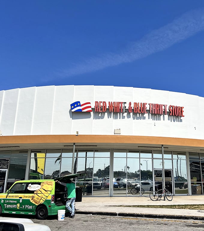 The unassuming exterior of Red White & Blue Thrift Store stands like a retail fortress in Hialeah, promising treasure hunters adventures that big-box stores can't deliver.