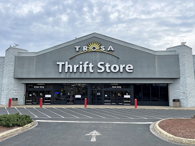 The TROSA Thrift Store's unassuming exterior hides a treasure trove within, like finding a secret portal to bargain heaven in Durham's retail landscape.