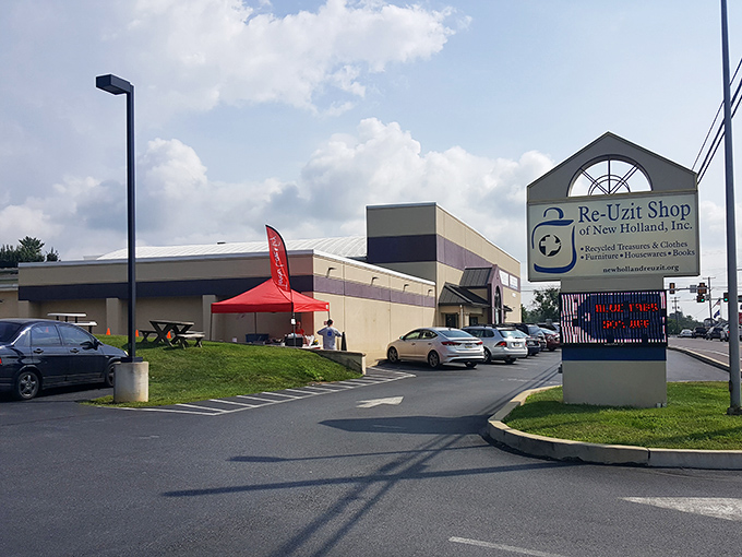 The sign says it all—recycling at its finest. One shopper's castoffs become another's discoveries in this thrifty paradise.