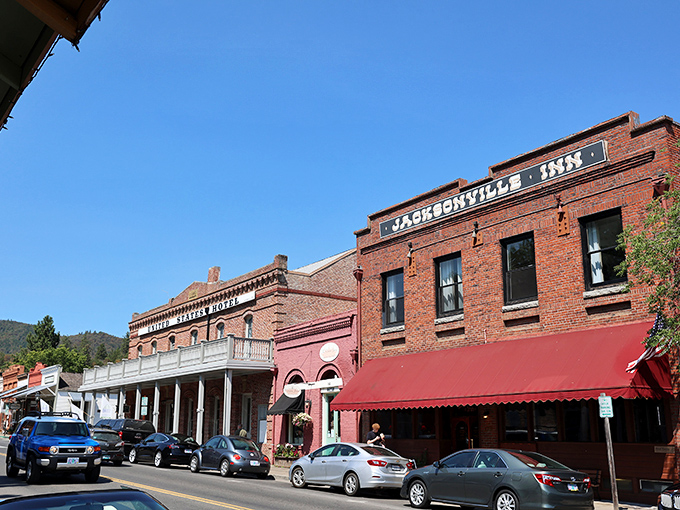 The Jacksonville Inn sign beckons from its brick facade – a promise of comfort and history that's been fulfilled for generations of travelers.