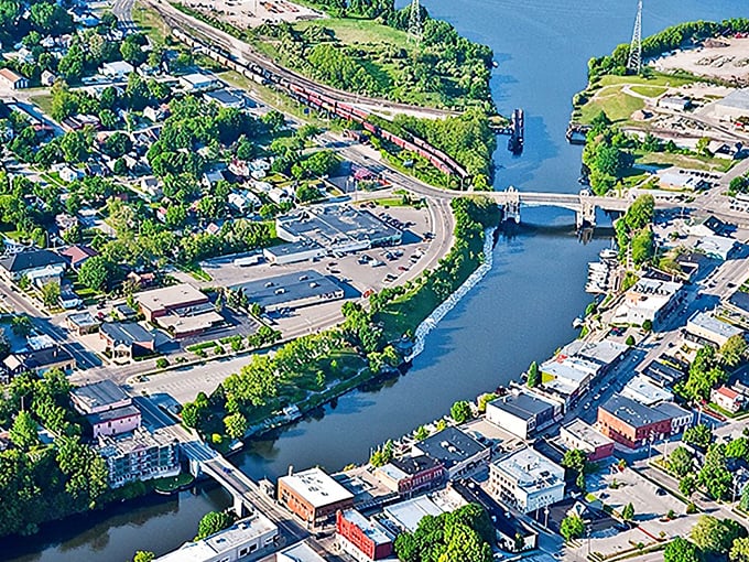 The Manistee River winds through town like nature's Main Street, connecting the community to both its past and Lake Michigan beyond.