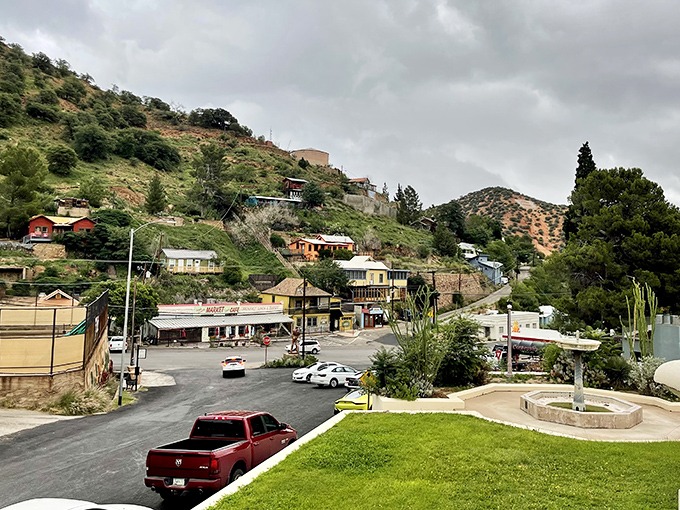 Bisbee's hillside homes cling to the mountainside like colorful barnacles, creating a vertical village where even the mailman deserves hazard pay.