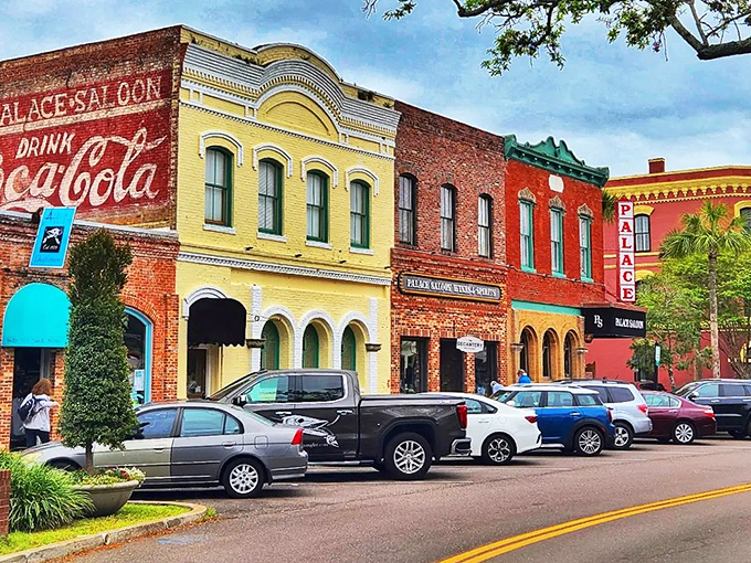 Centre Street's colorful Victorian facades transport you to a time when conversations happened on porches, not phones. The Palace Saloon's vintage Coca-Cola sign adds the perfect nostalgic touch. 