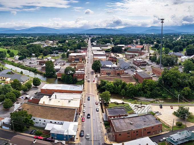 Luray unfolds like a storybook from above, with the Blue Ridge Mountains standing guard like gentle giants watching over their favorite small town.
