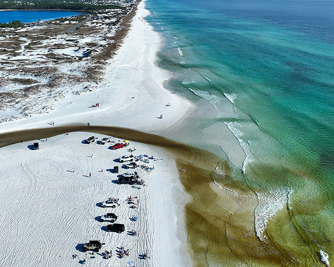 Paradise from above: Where emerald waters kiss sugar-white sands, creating Florida's most photogenic coastline. Mother Nature showing off again.