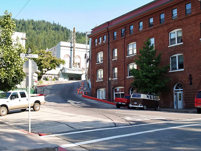 Downtown Dunsmuir's iconic California Theatre marquee stands tall against mountain backdrops, a nostalgic beacon in this railroad town where time slows deliciously.