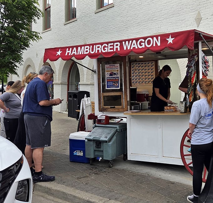The iconic red awning beckons like a culinary lighthouse on Miamisburg's brick-paved streets. Simple, unassuming, and hiding a century of burger perfection.