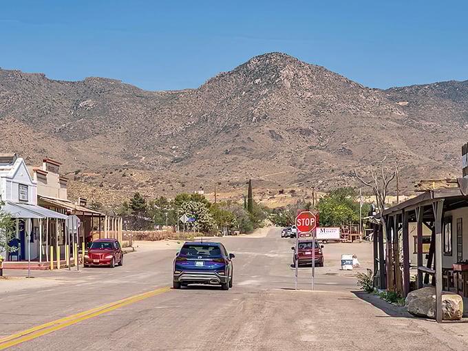 Main Street Chloride looks like a movie set, but it's the real deal – a living ghost town where the rugged Cerbat Mountains stand guard over Arizona's mining history.