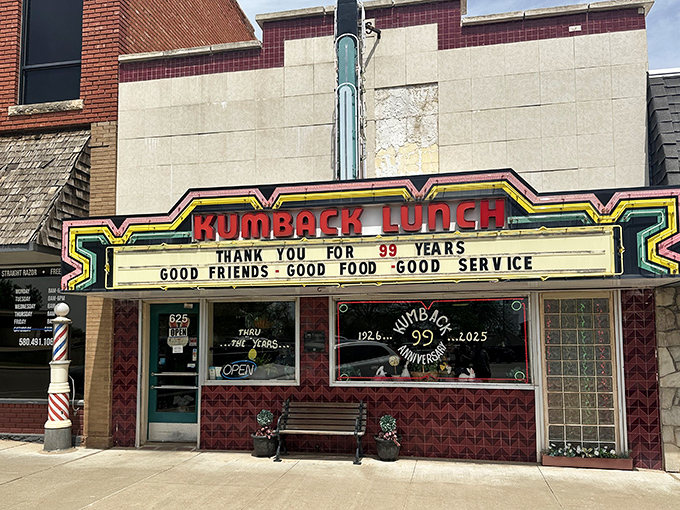 The neon-trimmed marquee of Kumback Lunch stands as a beacon of Americana in Perry, Oklahoma, celebrating nearly a century of hometown cooking.