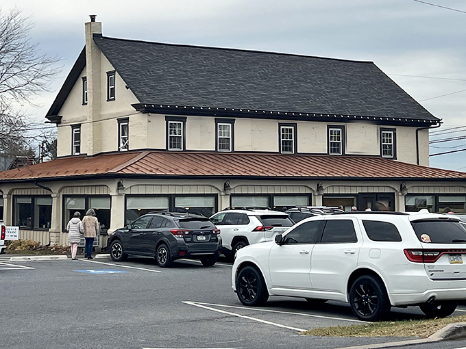 The white colonial fa&ccedil;ade of Brickerville House stands proudly against the Pennsylvania sky, its copper-trimmed porch promising comfort before you even step inside.