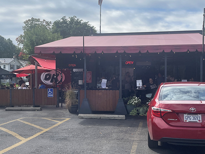 The unassuming burgundy awning of DK Diner beckons like a breakfast beacon in Grandview Heights. No fancy frills, just the promise of honest-to-goodness comfort food. 