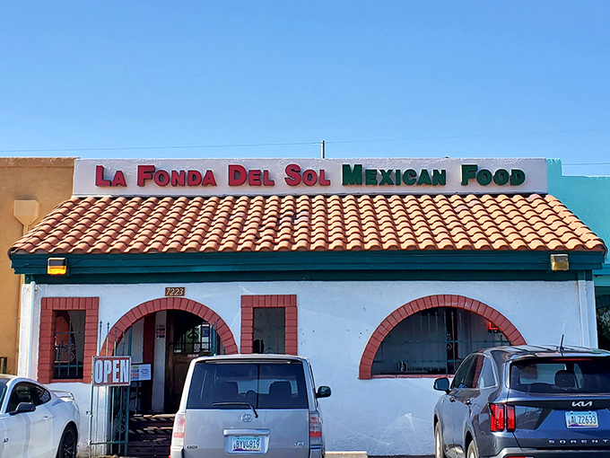 The unassuming exterior of La Fonda Del Sol beckons with its classic Spanish-style roof and distinctive red-trimmed arches&mdash;proof that culinary treasures often hide in plain sight.
