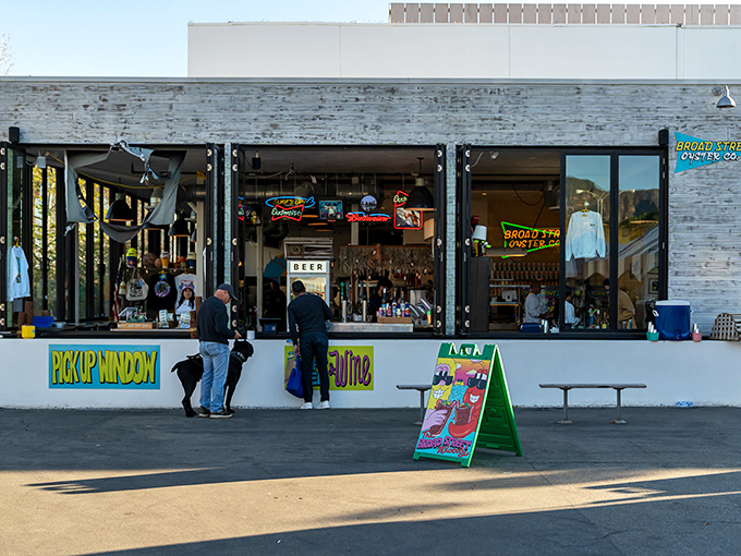 The unassuming storefront of Broad Street Oyster Company proves once again that culinary treasures often hide in plain sight, with its pickup window promising seafood salvation to those in the know.