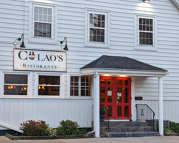 The charming white exterior of Colao's with its vibrant red door isn't just inviting&mdash;it's practically Italian for "get in here and eat something wonderful."