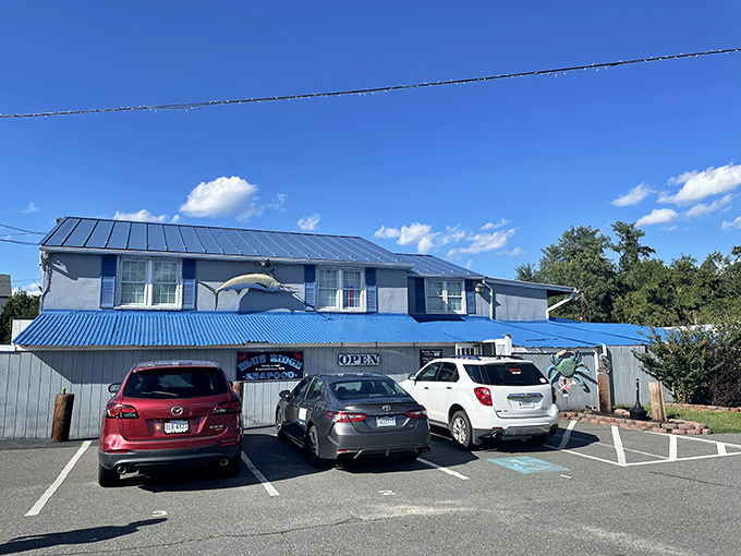 A humble blue facade that promises treasures from the sea&mdash;proof that the best seafood joints often come without fancy frills.