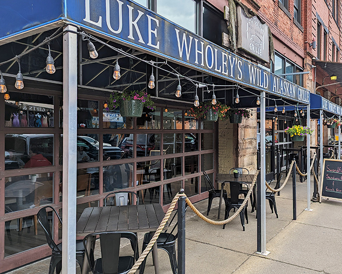 The iconic blue awning of Luke Wholey's beckons seafood lovers like a maritime lighthouse in Pittsburgh's bustling Strip District.