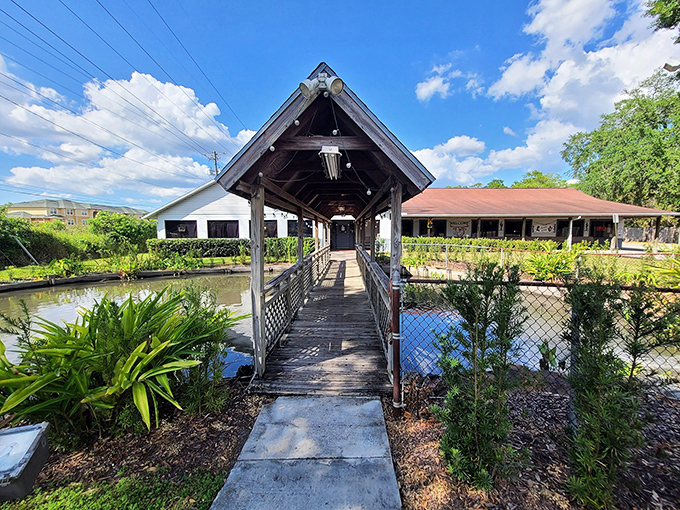 The iconic wooden bridge to Frontier Steakhouse isn't just an entrance&mdash;it's a promise that you're crossing over into serious steak territory.