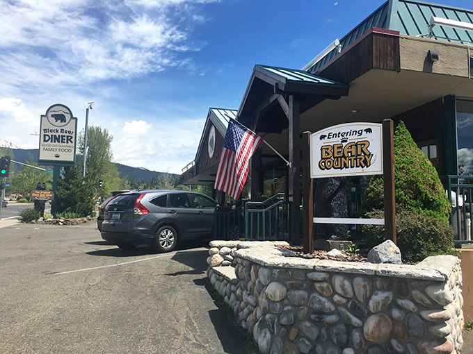 Entering Bear Country indeed! The stone-and-timber entrance feels like stepping into a national park lodge where pancakes, not park rangers, await.
