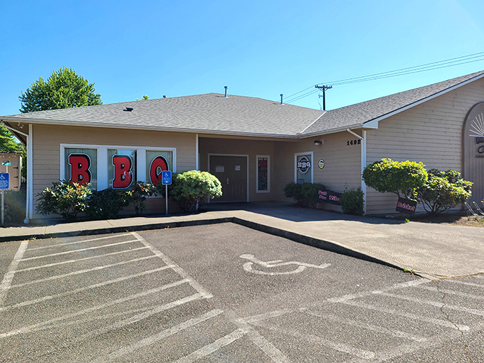 The unassuming exterior of Roger That BBQ proves the old adage: never judge a smokehouse by its siding. Those three red letters promise more flavor than most fancy restaurants deliver.
