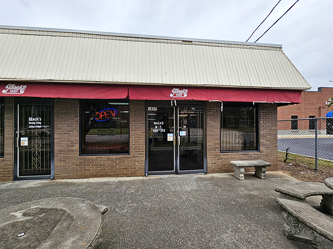 Mack's modest brick exterior with its vintage newspaper boxes tells you everything you need to know: this place values substance over style.