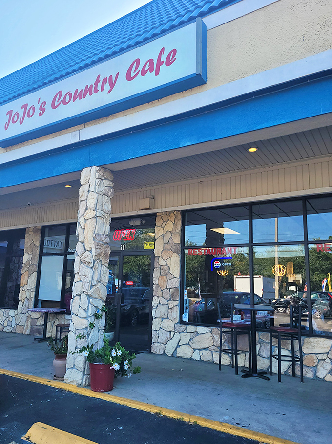 That red script against the blue roof isn't just signage&mdash;it's a promise of comfort food that makes snowbirds forget why they ever considered flying back north.