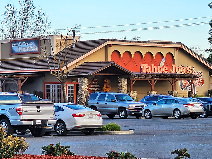The mountain lodge architecture of Tahoe Joe's stands out in Fresno like a Sierra Nevada outpost, promising carnivorous delights within those rustic walls.