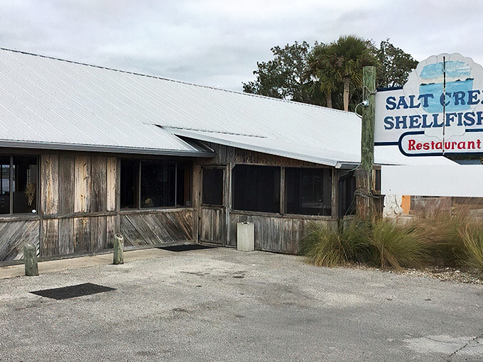 The unassuming exterior of Salt Creek Restaurant might fool you, but locals know this weathered wooden treasure houses seafood magic within.