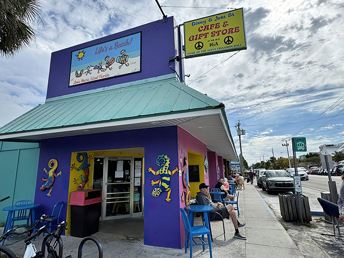 Colorful geckos dance across vibrant walls while outdoor seating beckons with a "Life's a Beach" sign that isn't just decoration—it's a philosophy.
