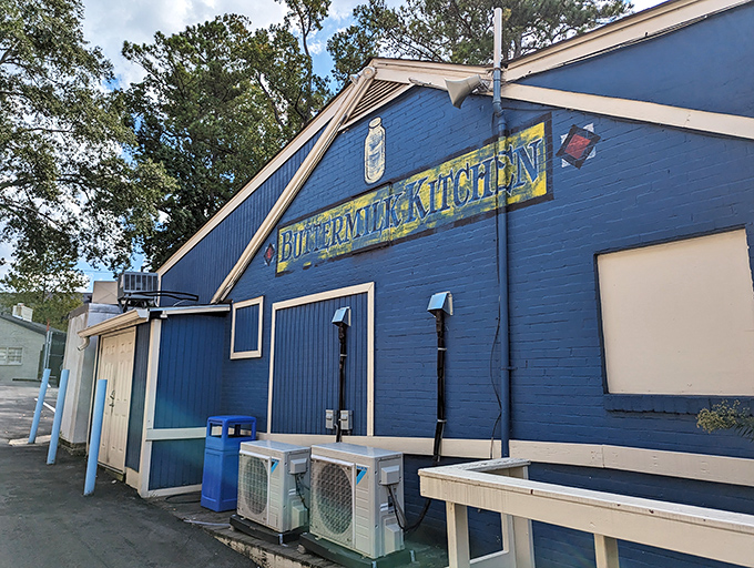 That bold "Buttermilk Kitchen" sign against the azure blue exterior isn't just announcing a restaurant—it's broadcasting a breakfast revolution in progress.