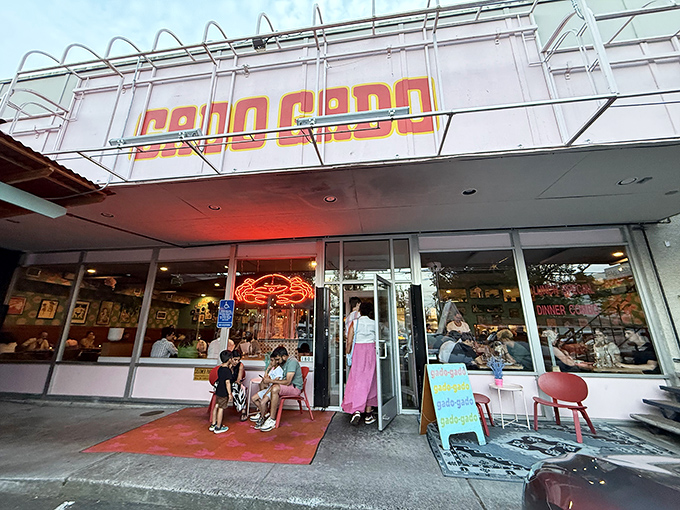 The neon-lit "GADO GADO" sign glows like a beacon of culinary adventure, promising Indonesian delights in Portland's vibrant dining landscape.