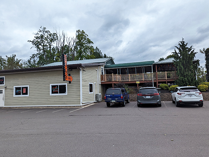 A roadside treasure that doesn't need fancy frills to announce its presence—the BBQ sign says everything you need to know.