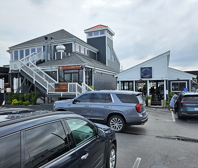 The iconic blue-gray exterior of Harris Crab House stands like a beacon for seafood lovers, promising treasures from the Chesapeake just beyond those doors.