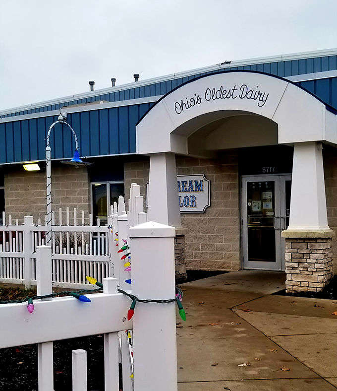 Holiday lights on the white picket fence, welcoming ice cream pilgrims to this Sandusky institution where calories don't count.