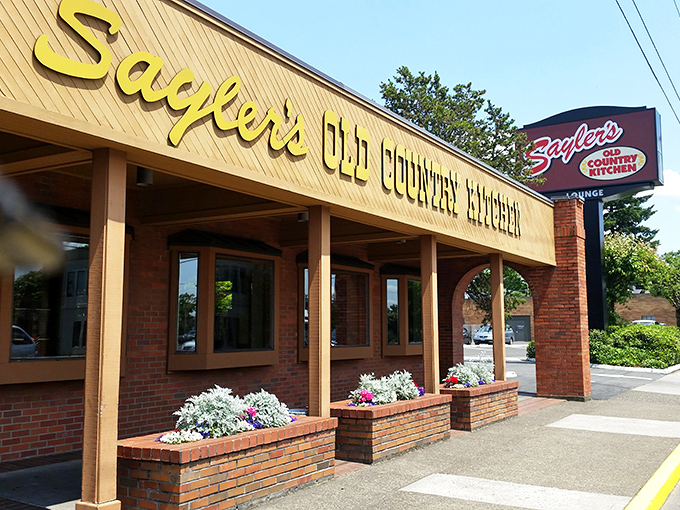 The iconic yellow sign beckons like a beacon of beef salvation on Southeast Stark Street. Portland's steak sanctuary has been turning carnivores into believers for generations.
