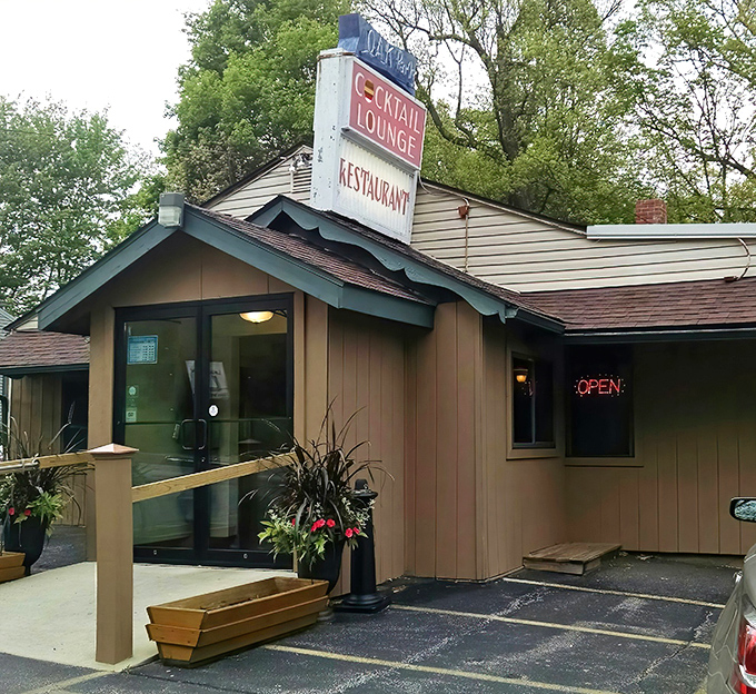 That vintage "COCKTAIL LOUNGE" sign isn't just advertising—it's a time machine to when dinner was an event and nobody rushed you through dessert.
