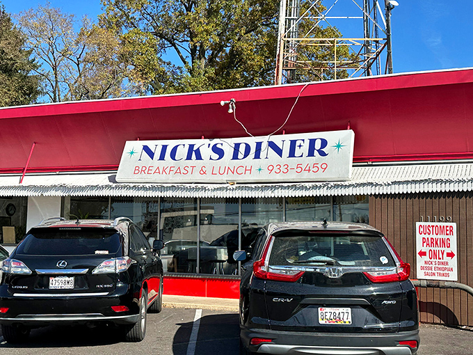 The bright red awning of Nick's Diner stands out like a beacon of breakfast hope on an ordinary Wheaton street corner.
