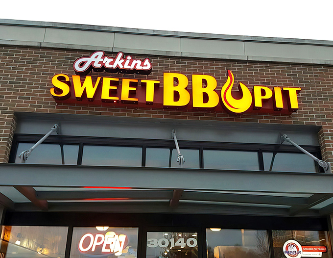The brick facade might be humble, but that bold red sign is like a beacon calling to serious barbecue pilgrims across Michigan.