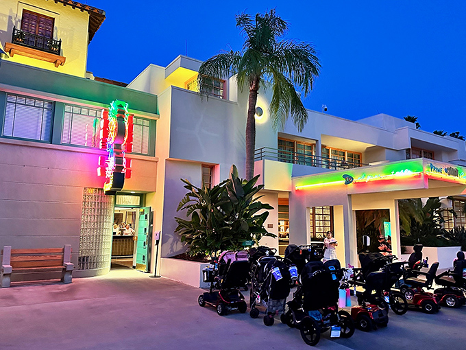 The neon-bright exterior of 50's Prime Time Caf&eacute; stands as a technicolor beacon of nostalgia amid the Florida palms. Mom's kitchen never looked this inviting from the outside.