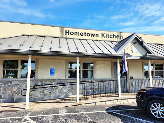 The unassuming exterior of Hometown Kitchen stands like a culinary lighthouse in Quarryville, beckoning hungry travelers with its blue metal roof and simple charm.