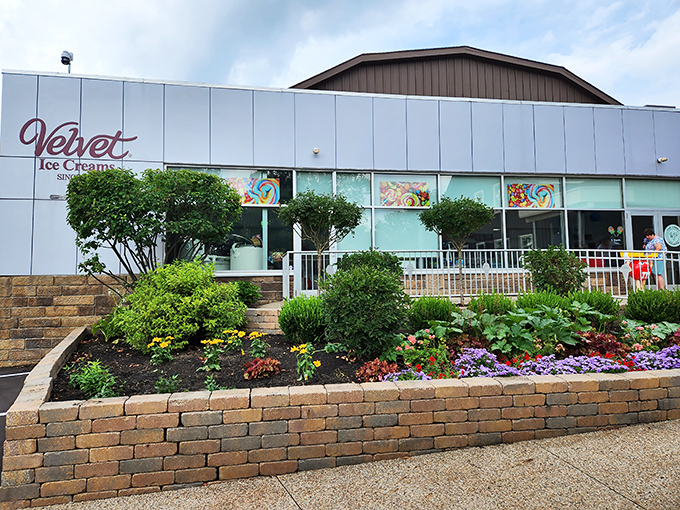 The historic black-and-white buildings of Ye Olde Mill welcome visitors with manicured landscaping and a promise of sweet memories to come.