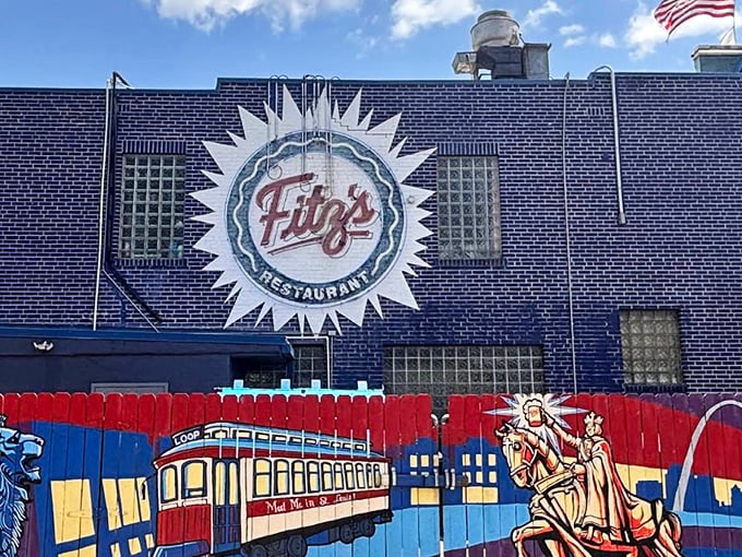 The iconic blue brick exterior of Fitz's with its sunburst logo announces itself like a fizzy beacon in St. Louis's Delmar Loop neighborhood.