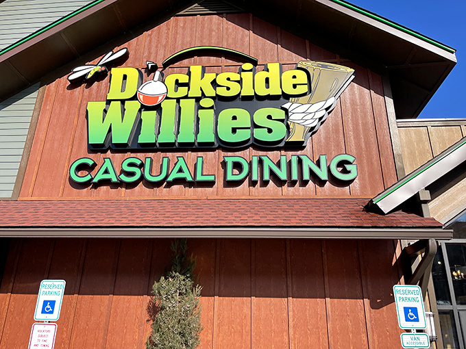 The wooden facade of Dockside Willies welcomes hungry travelers like a lighthouse guiding ships to culinary salvation.
